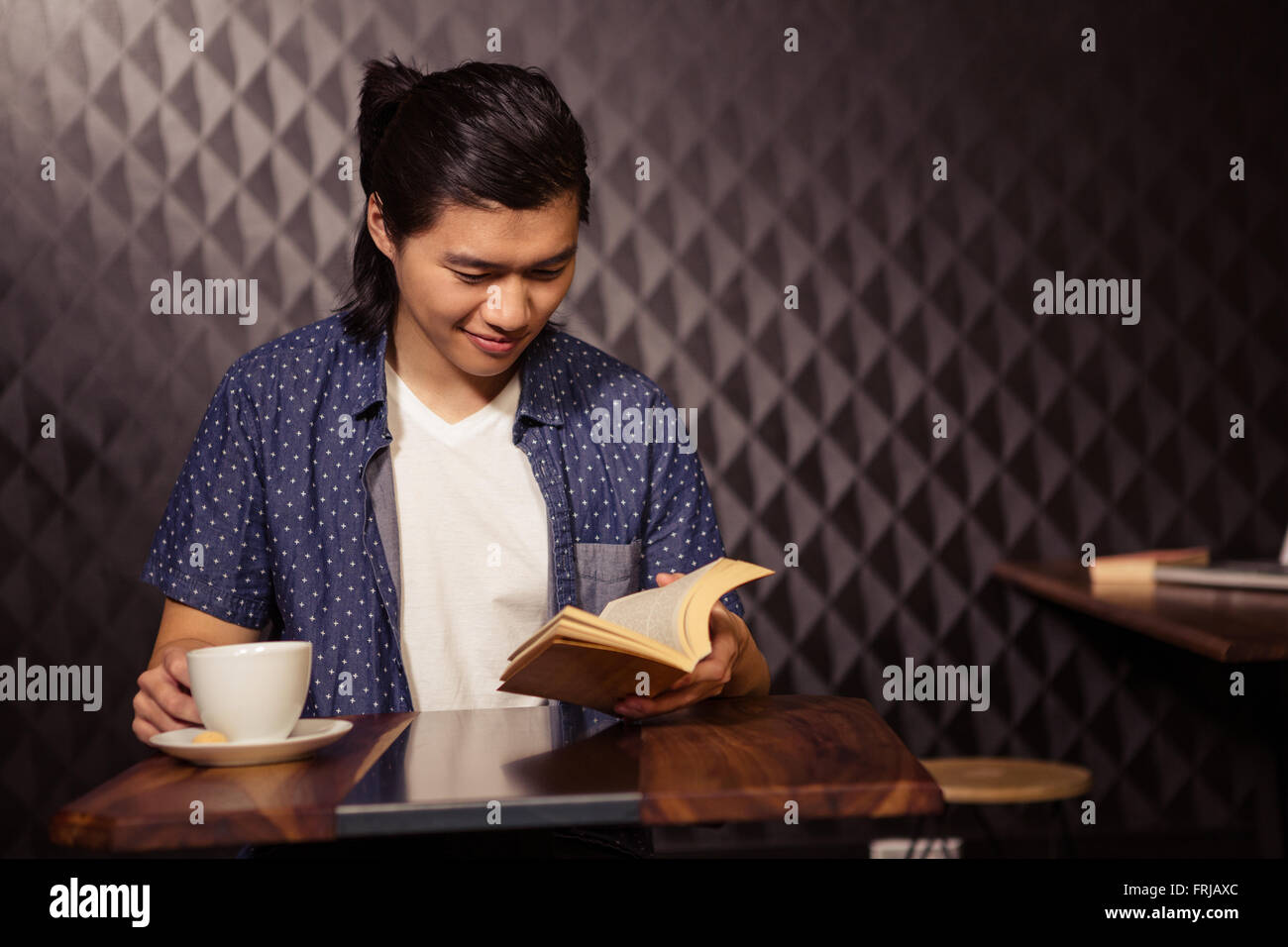 Man reading a book Stock Photo - Alamy