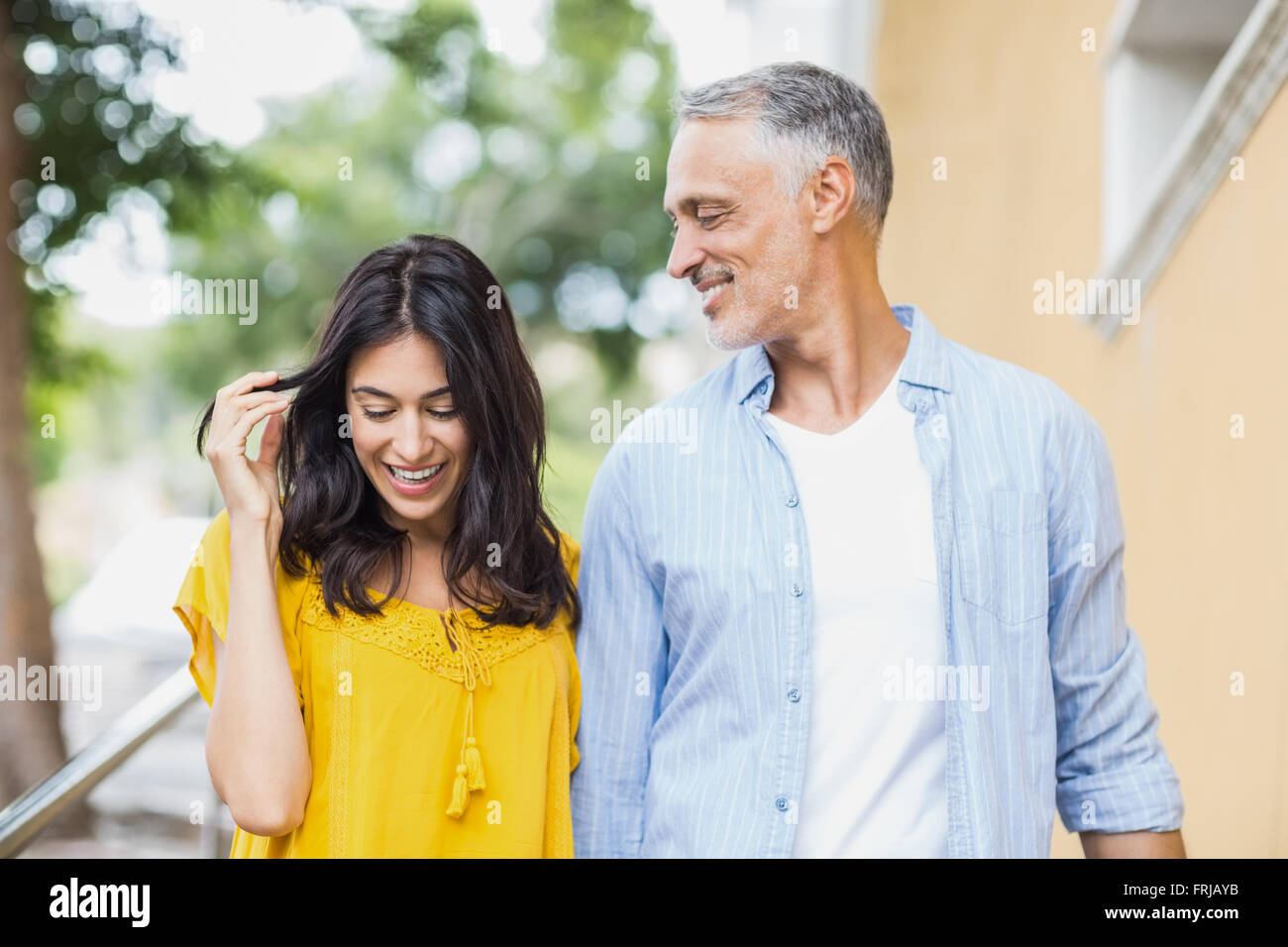 Front view of happy couple Stock Photo - Alamy