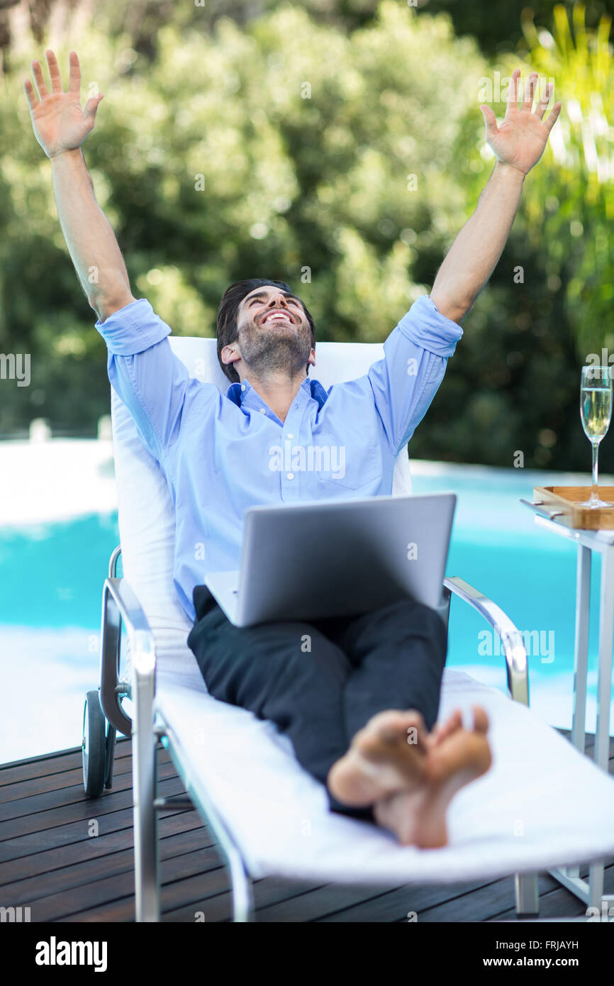 Man with laptop pool hi-res stock photography and images - Alamy