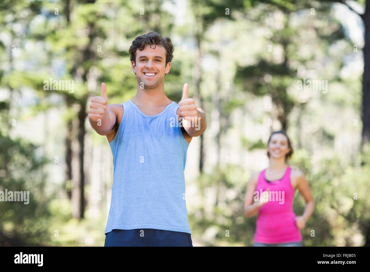 Woman gesturing in green hi-res stock photography and images - Alamy