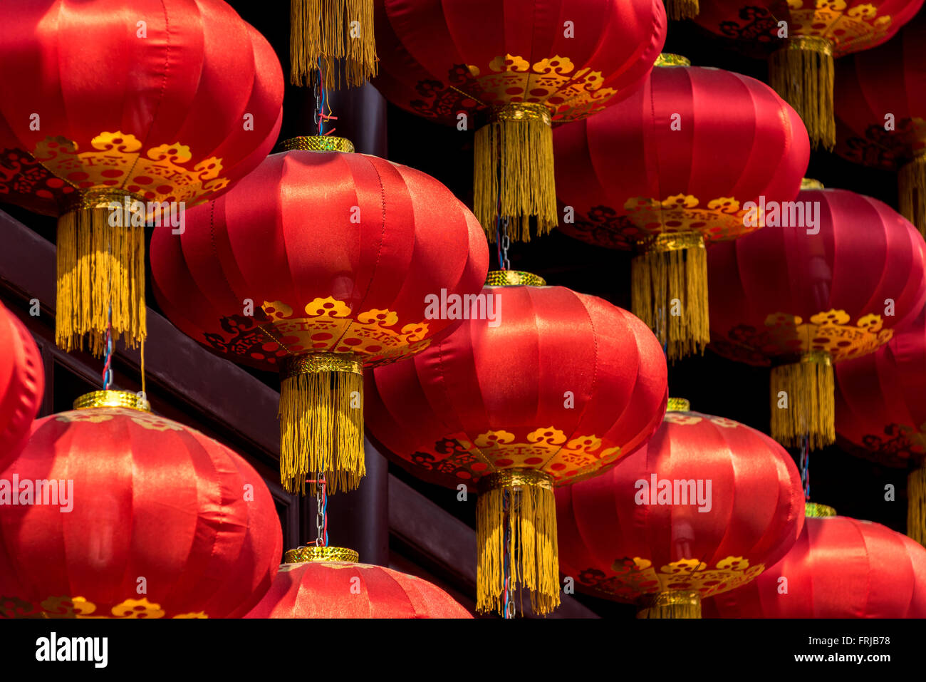 Red Chinese lanterns hanging from a traditional building in Shanghai ...