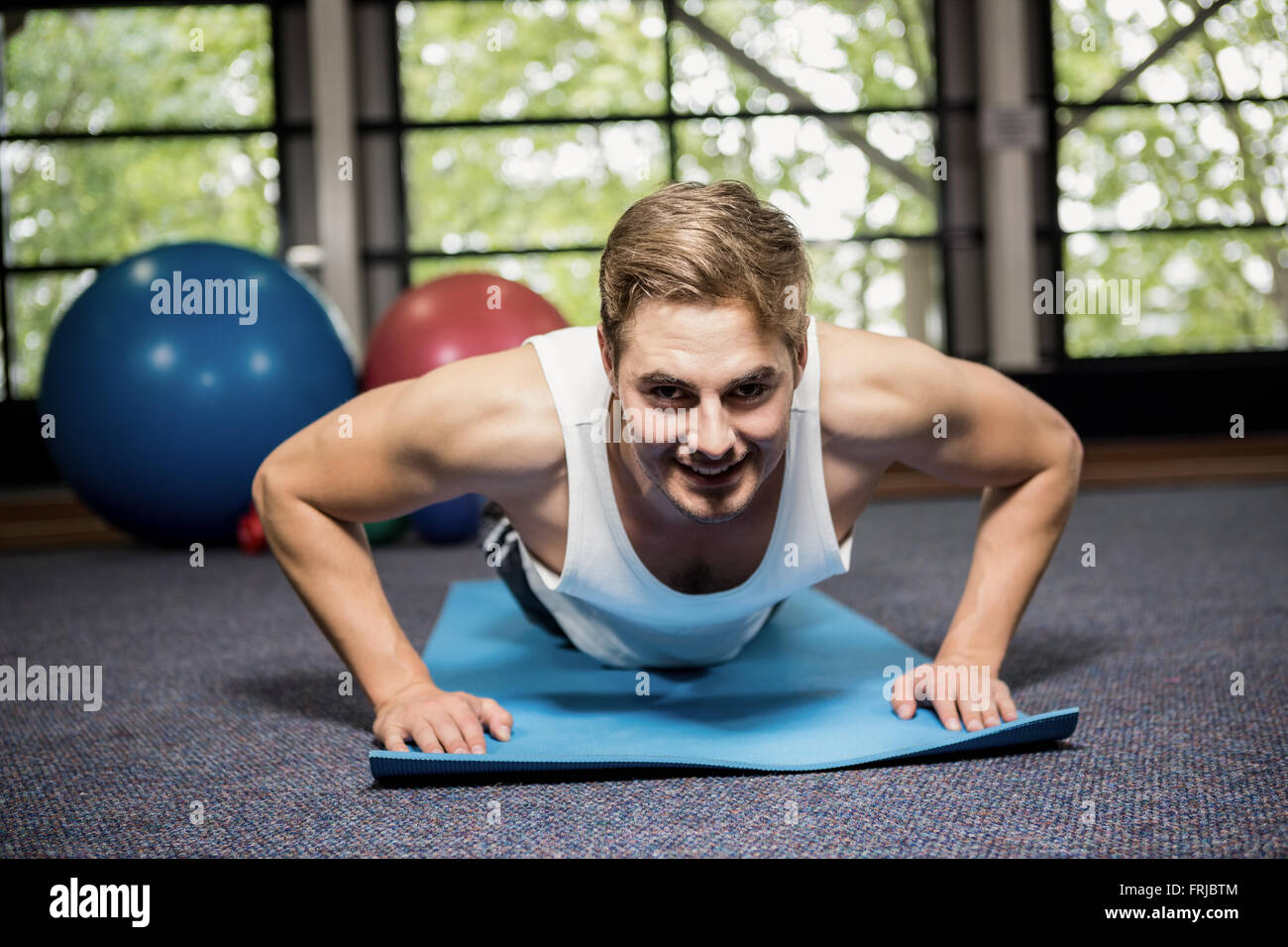 Portrait happy man training hi-res stock photography and images - Alamy