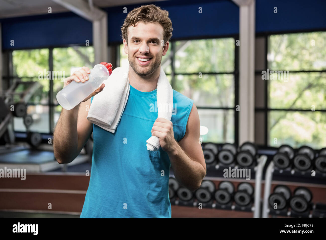 Man having water after workout Stock Photo - Alamy