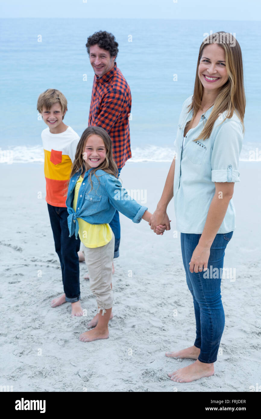 Happy family by the sea hi-res stock photography and images - Alamy
