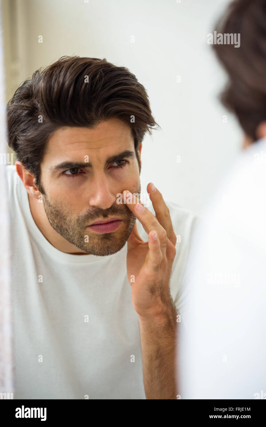 Checking face hi-res stock photography and images - Alamy
