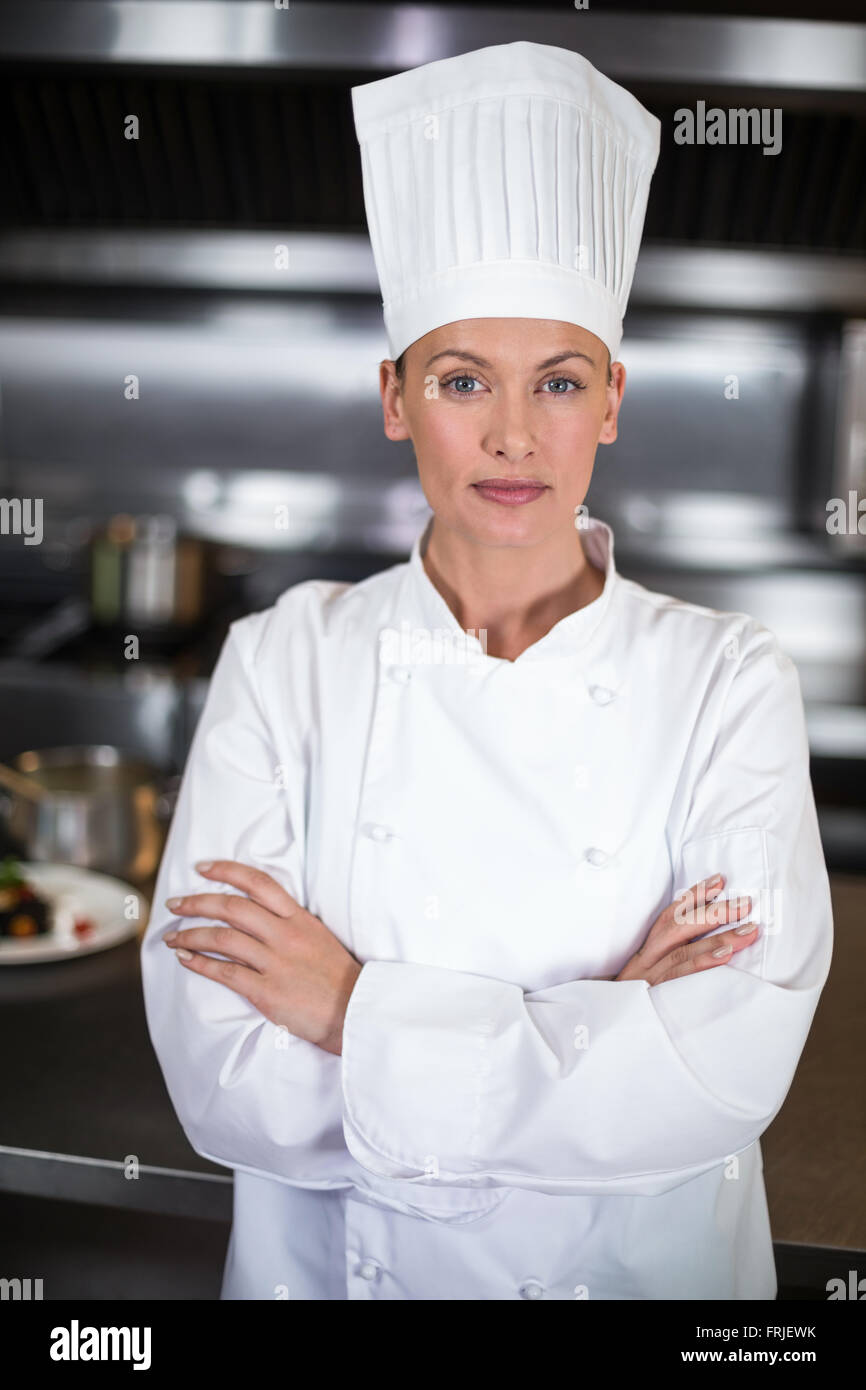 Portrait of confident female chef in kitchen Stock Photo - Alamy