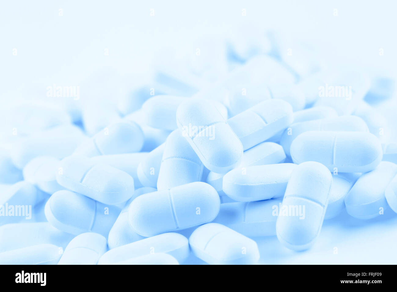 Pile of tablets closeup Stock Photo - Alamy