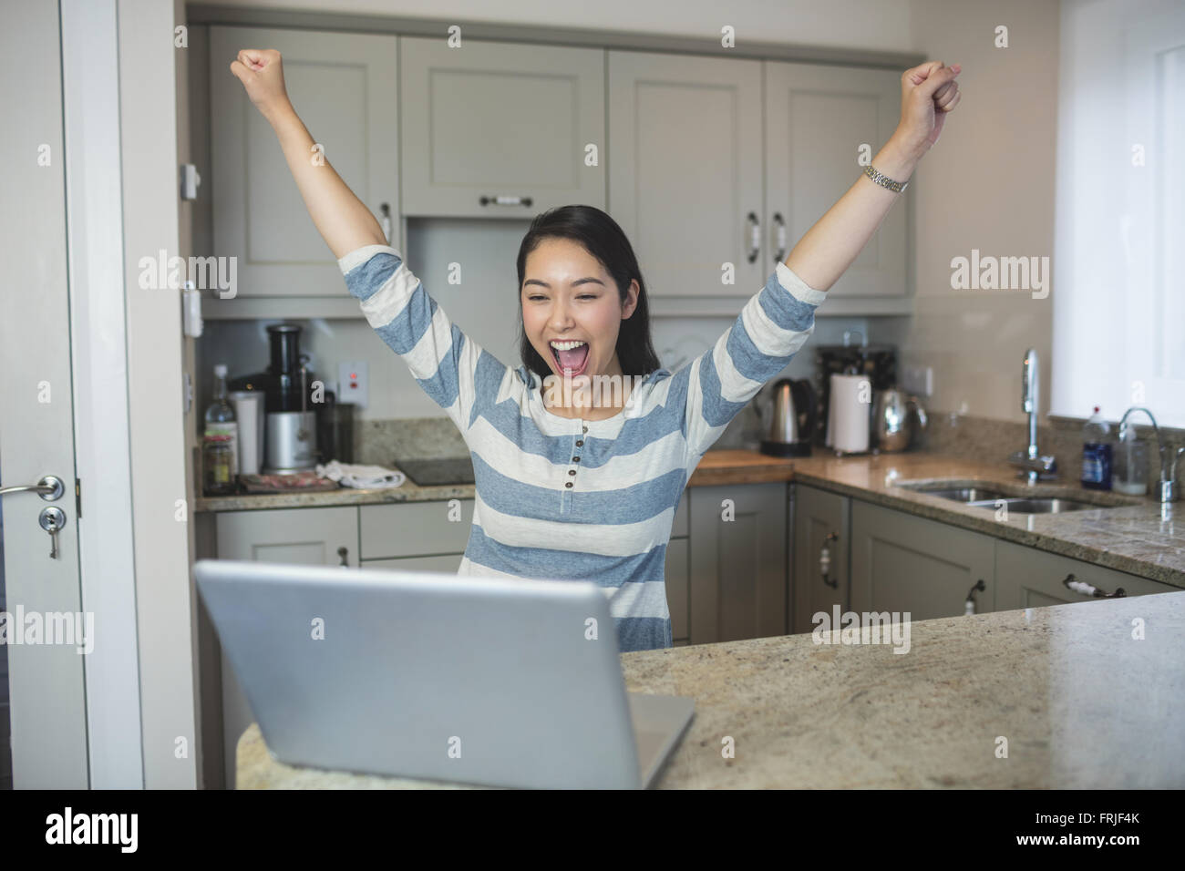 Attractive excited woman in hi-res stock photography and images - Alamy
