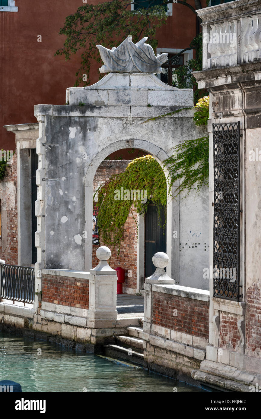 Venice, Italy. Stone steps lead down to the water outside the entrance ...