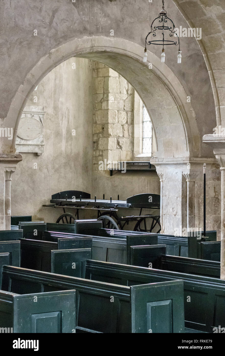 All Saints Church, Enford, Wiltshire, UK. An old wheeled bier inside ...