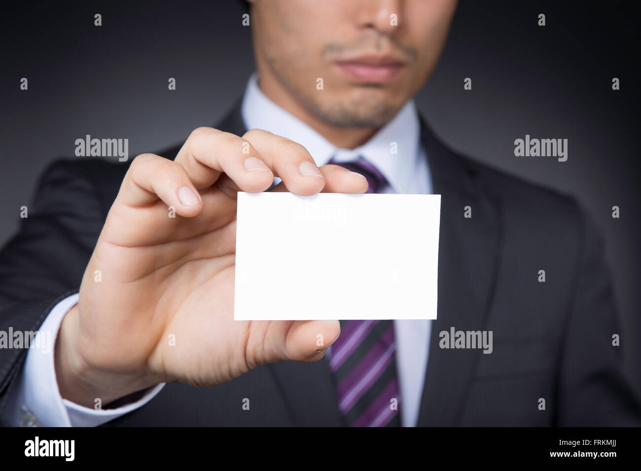 businessman with card Stock Photo - Alamy