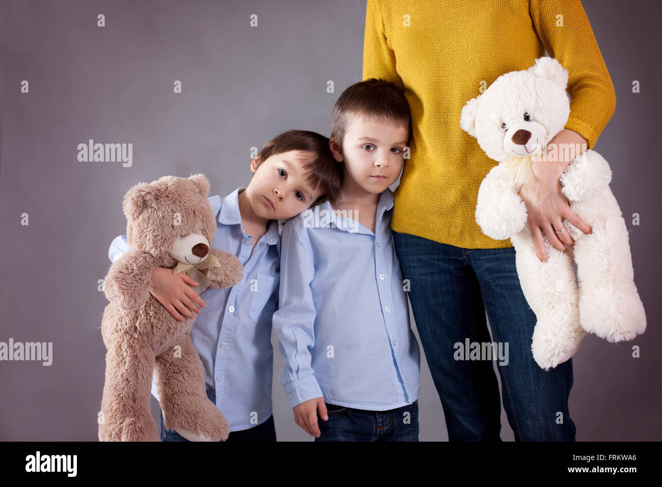 Siblings hugging sad hi-res stock photography and images - Alamy