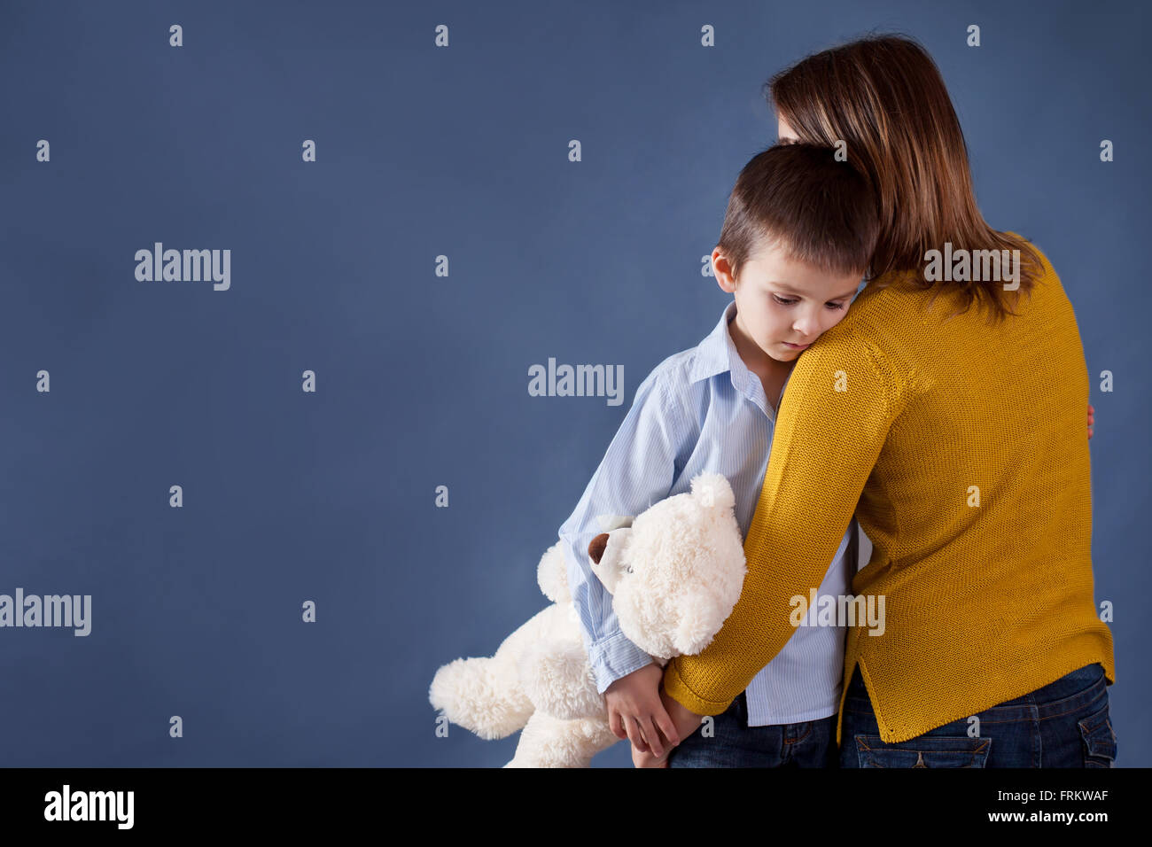 Two Sad Boys Hugging