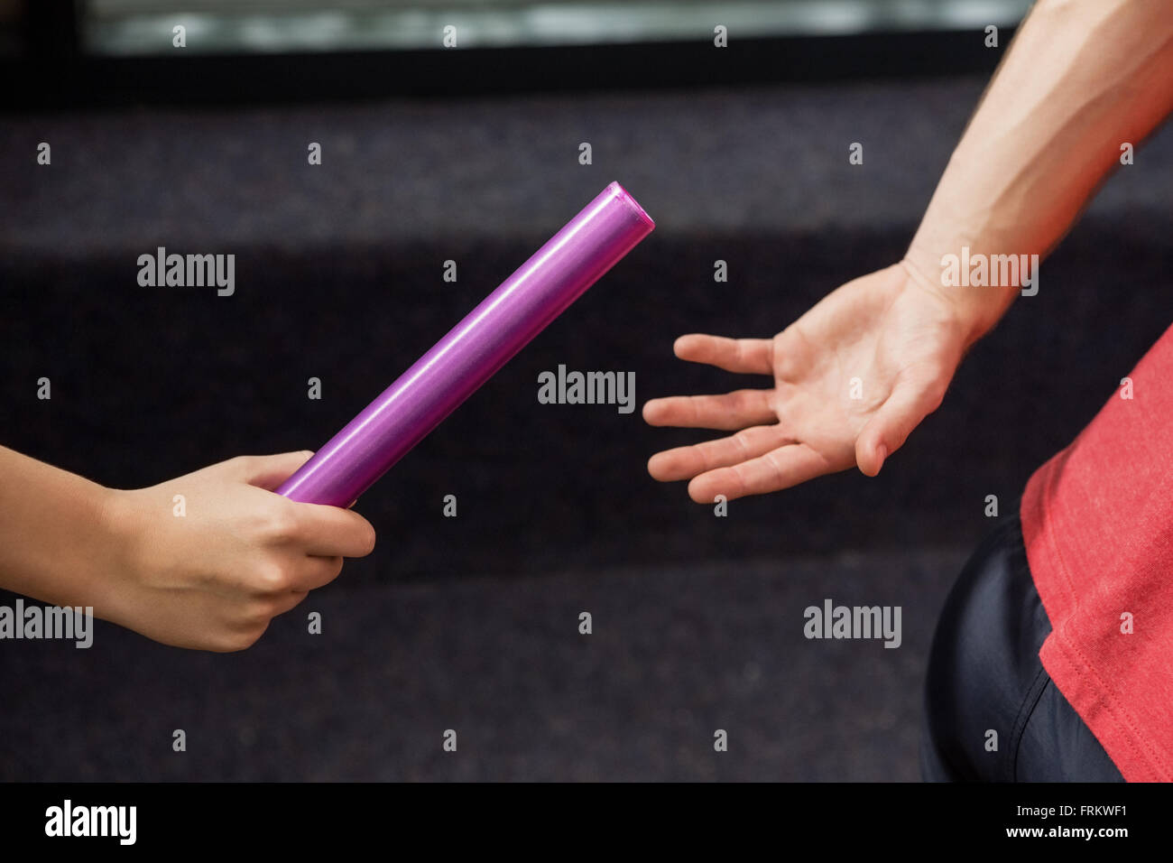 Passing the baton hi-res stock photography and images - Alamy
