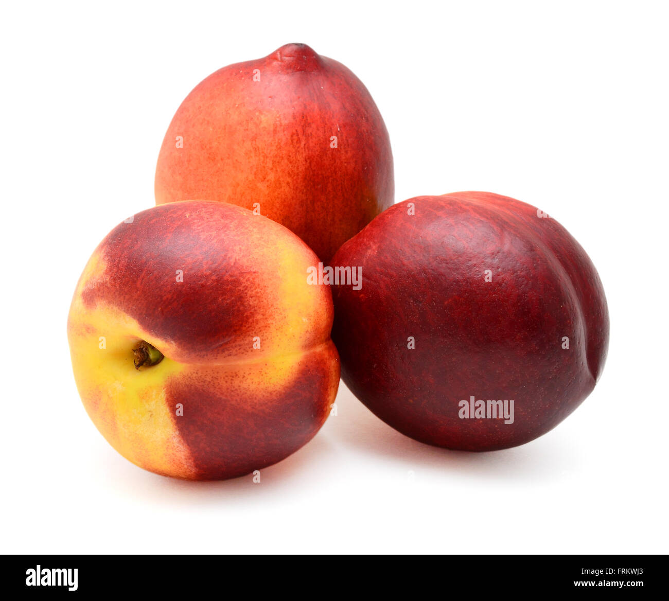 Three fresh peaches isolated on white background Stock Photo - Alamy