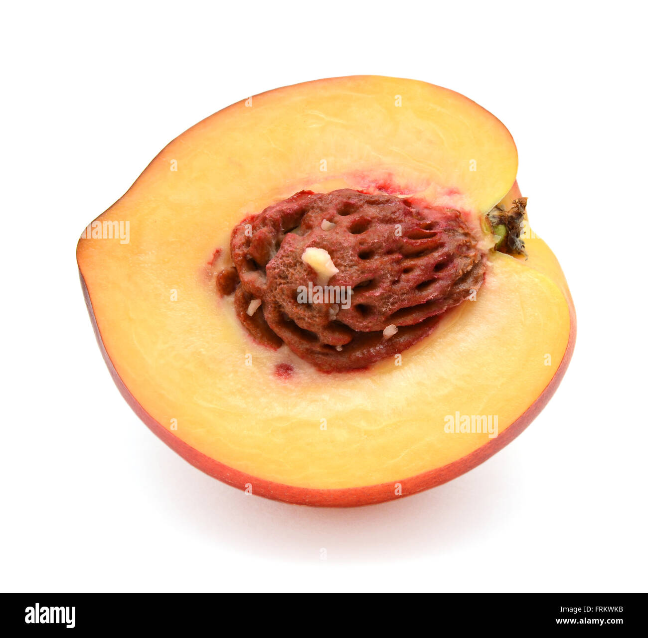 Half of peach isolated on white background Stock Photo - Alamy