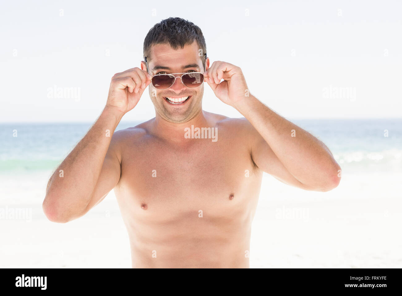 Man on the beach hi-res stock photography and images - Alamy
