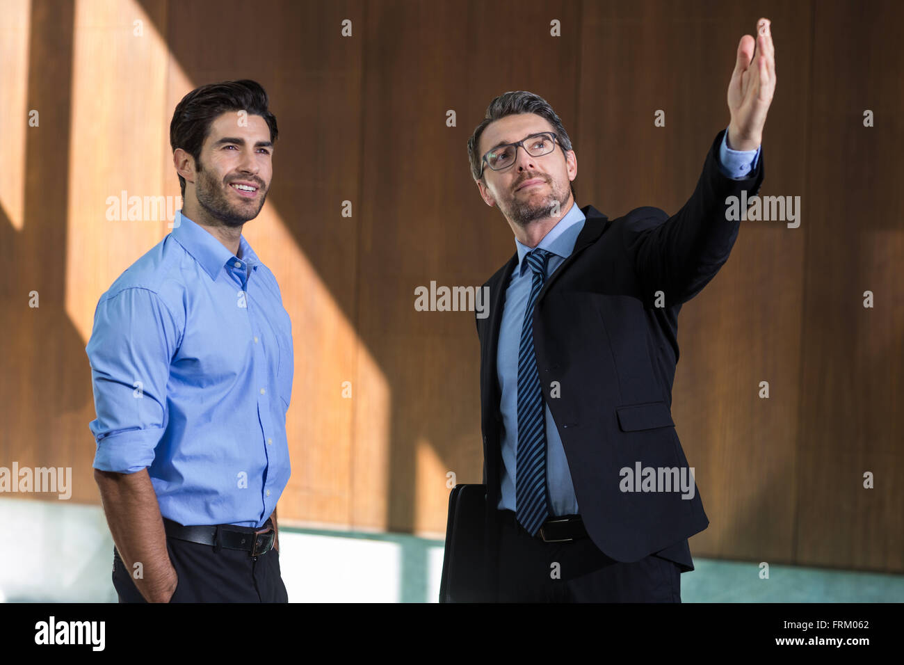 Real estate showing property to a man Stock Photo - Alamy