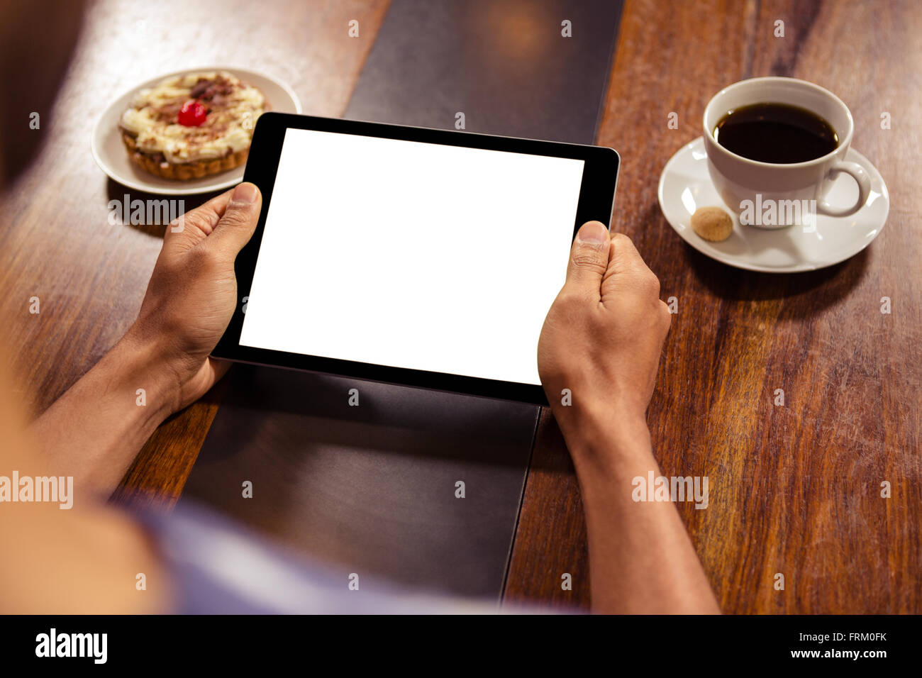 Man using a tablet Stock Photo - Alamy