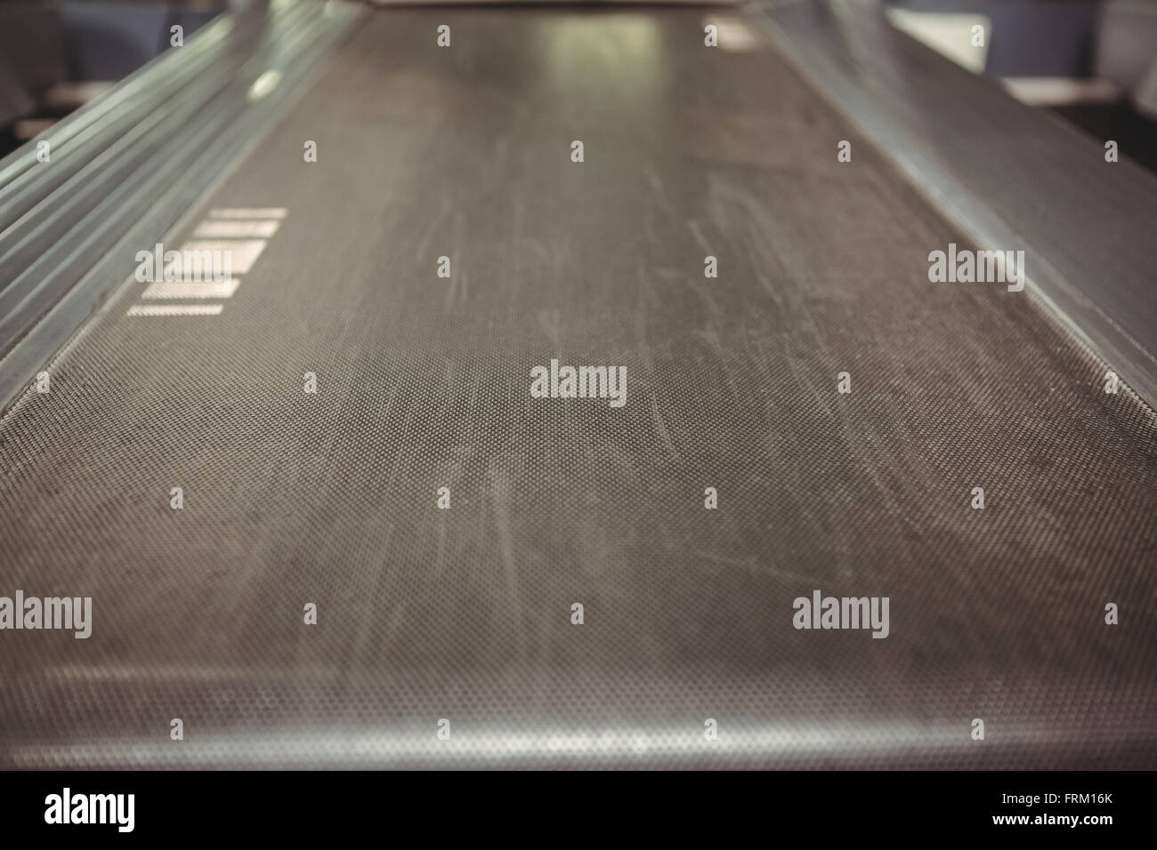 Close up of treadmill running area Stock Photo - Alamy