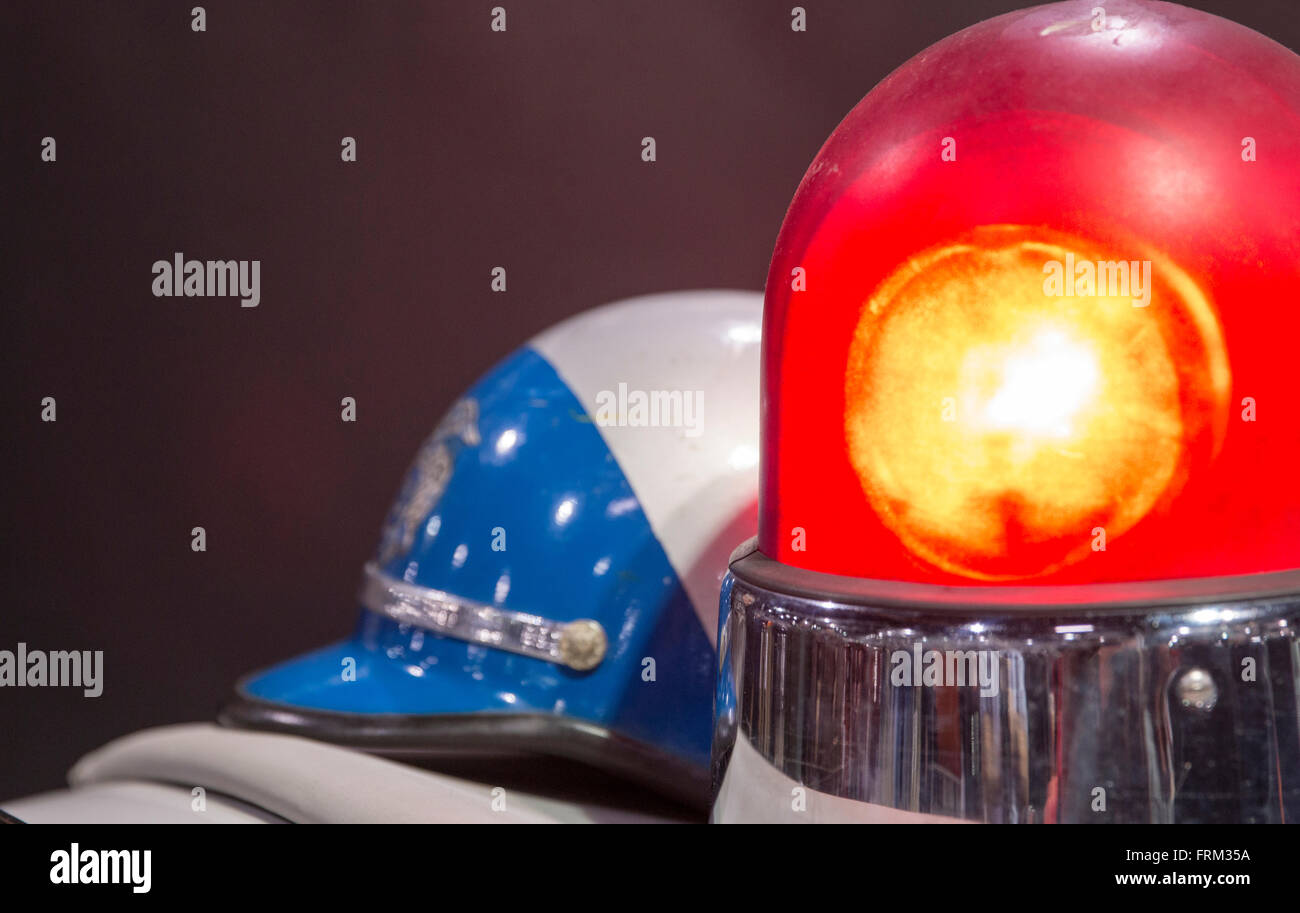 Vintage Police car emergency light and helmet Stock Photo - Alamy