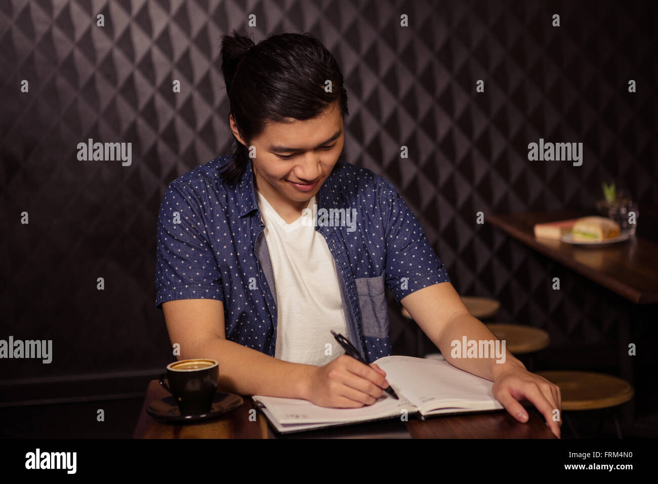 Man taking notes Stock Photo - Alamy