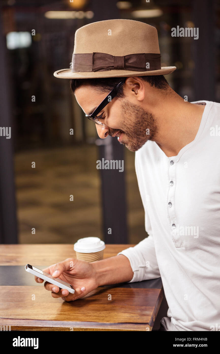 Man using his smartphone Stock Photo - Alamy