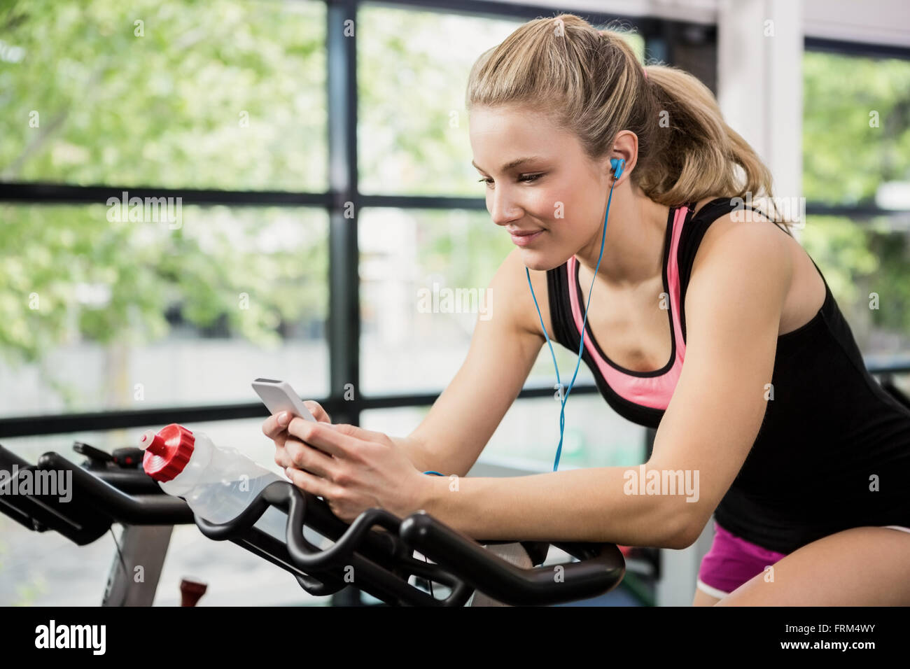 Woman listening music typing message hi-res stock photography and ...