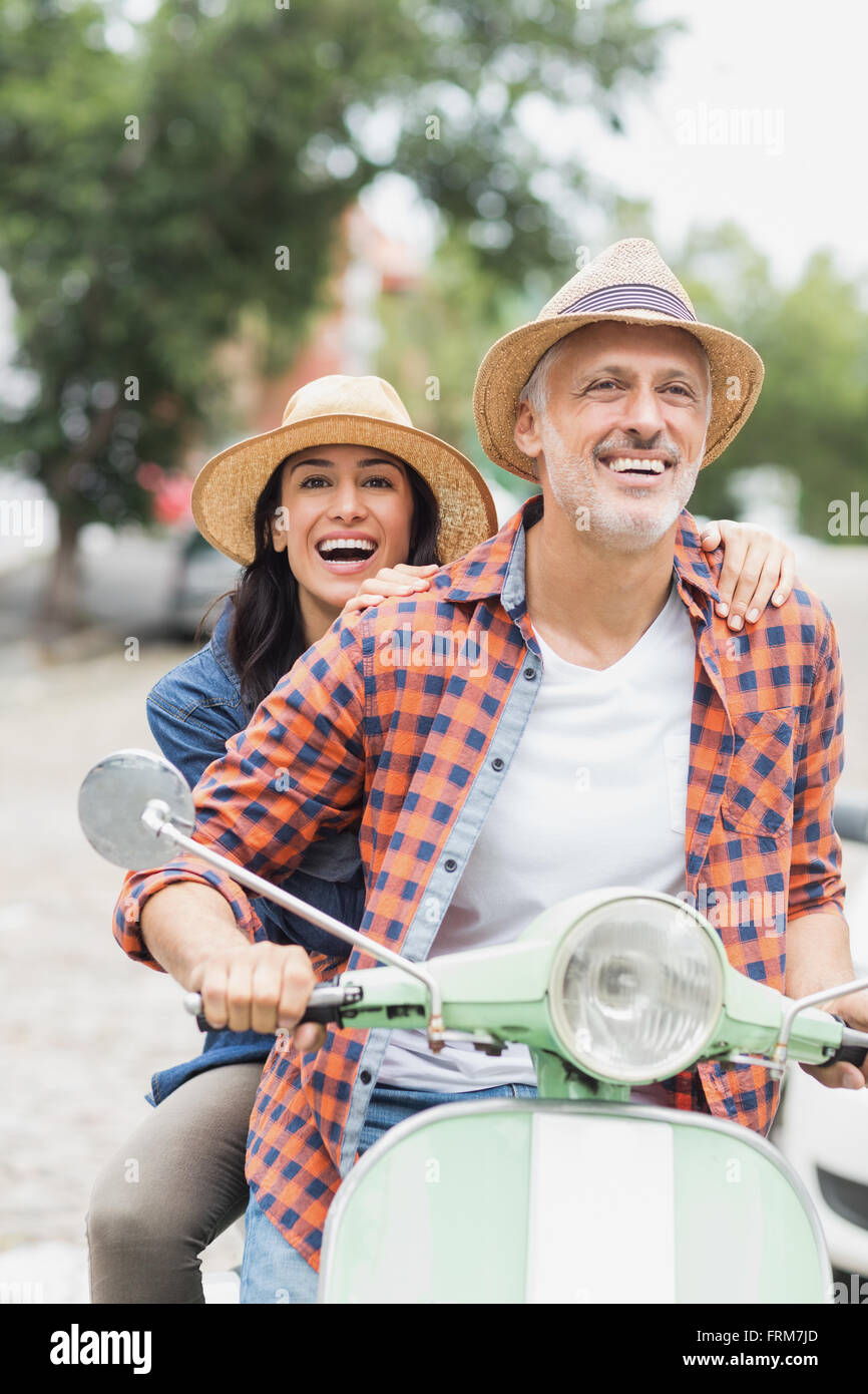 Couple of moped hi-res stock photography and images - Alamy