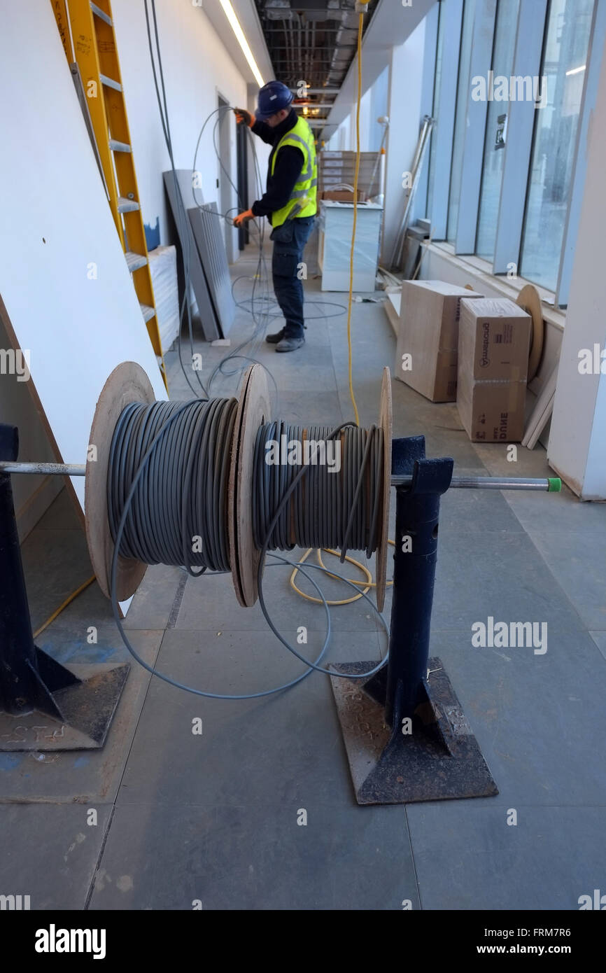 Industrial Electrician Pulling Wire