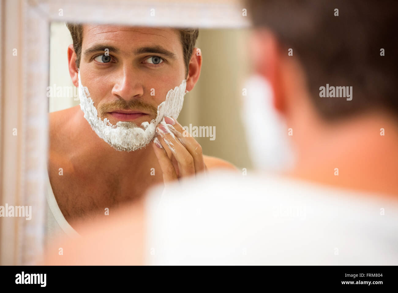 Man applying shaving foam Stock Photo - Alamy