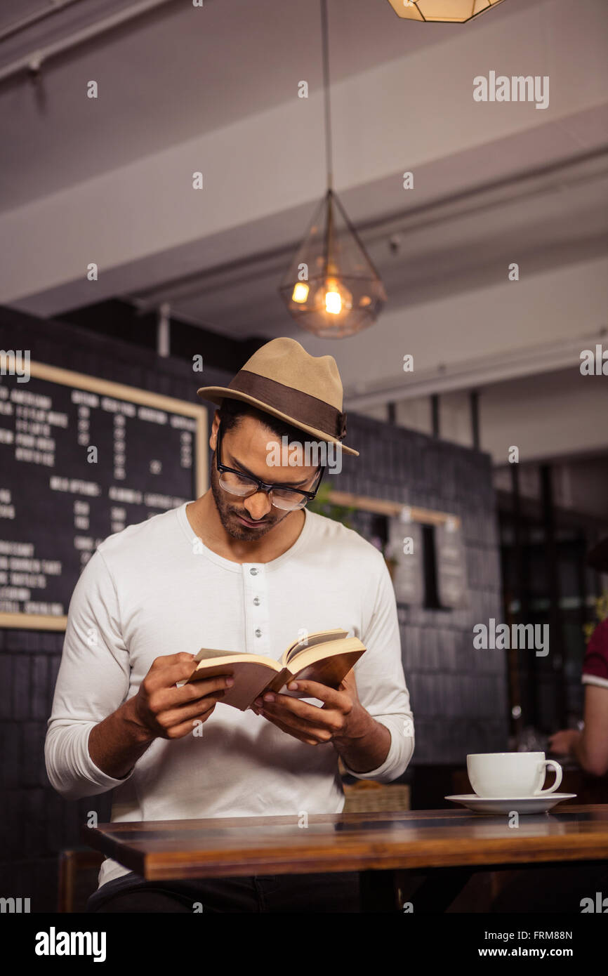 Man reading a book Stock Photo - Alamy