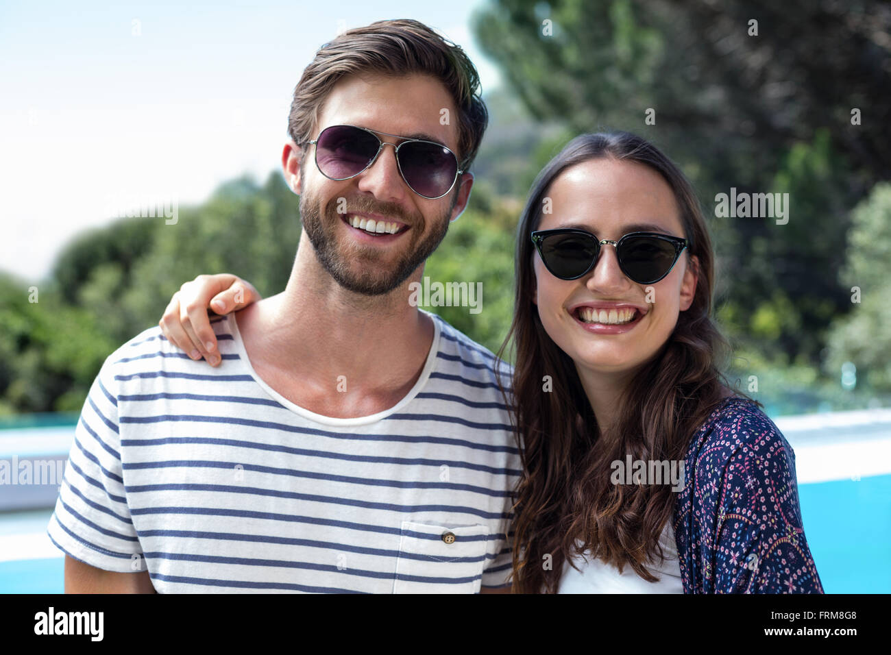 Couple pool resort hi-res stock photography and images - Alamy