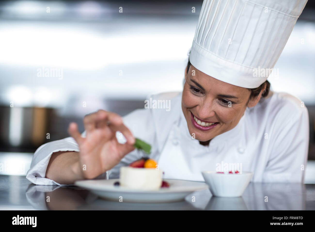Garnishing food hi-res stock photography and images - Alamy