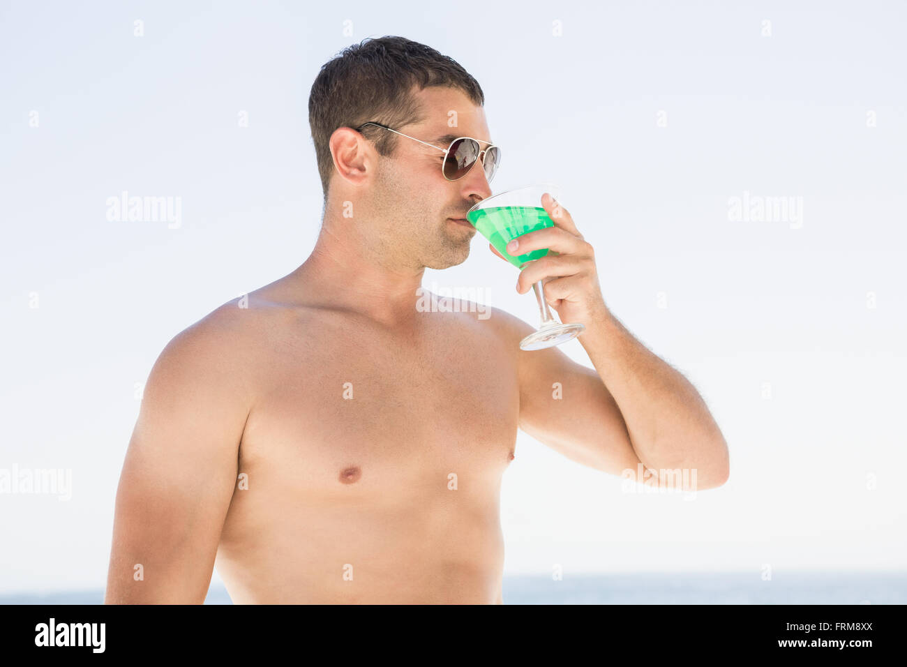 Man beach cocktail relax hi-res stock photography and images - Alamy
