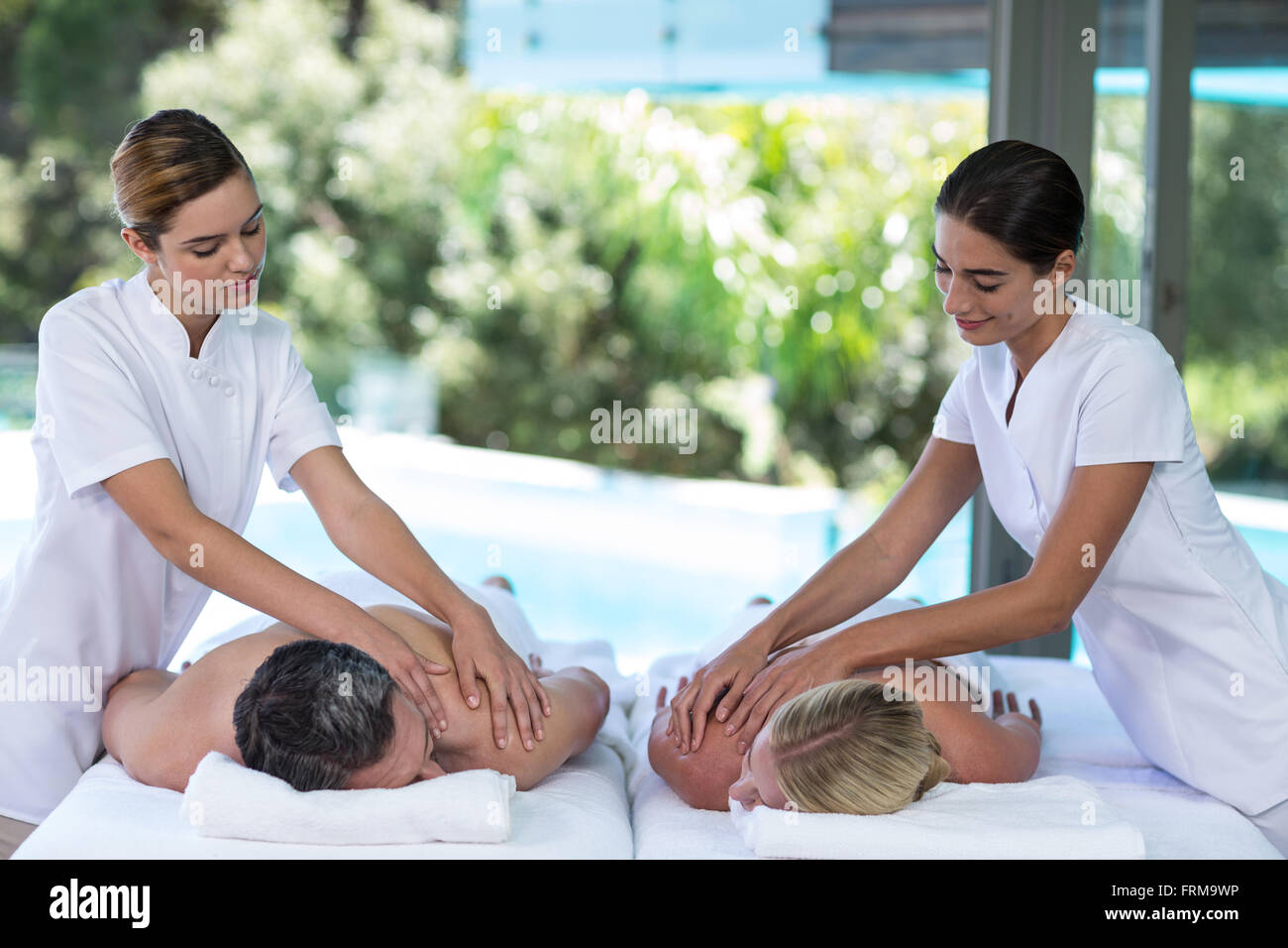 Young masseur hi-res stock photography and images - Alamy