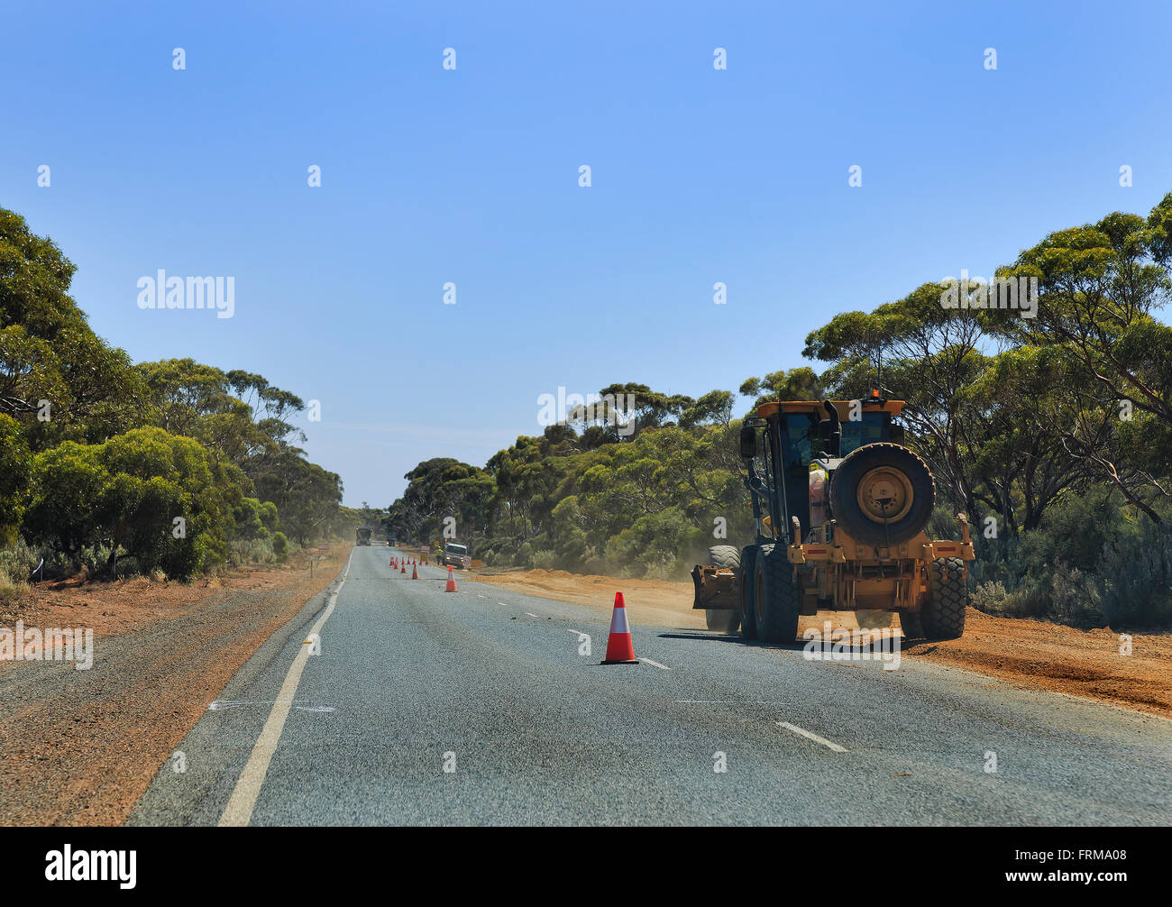 roadworks on a highway in Western Australia. Heavy machinery tractor ...