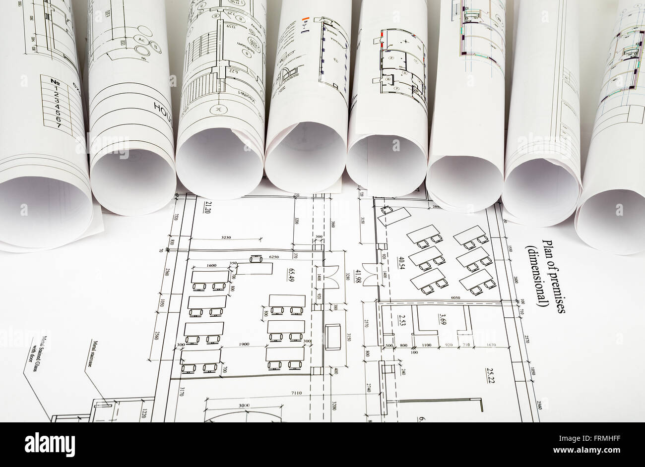 Architecture plan and rolls of blueprints Stock Photo - Alamy