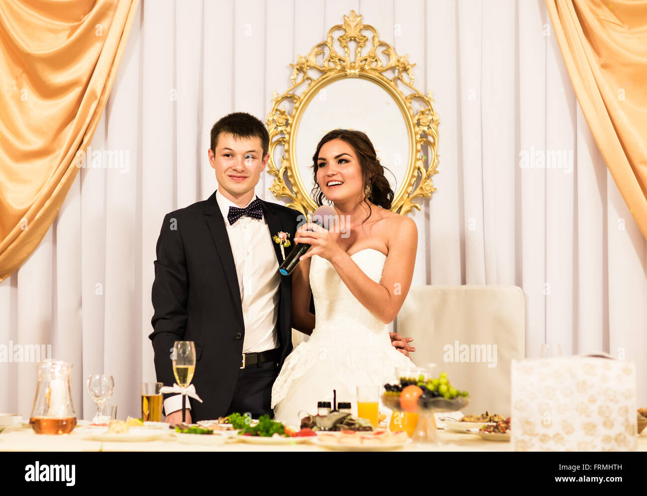 Bride And Groom Celebrating With Guests At Reception Stock Photo - Alamy