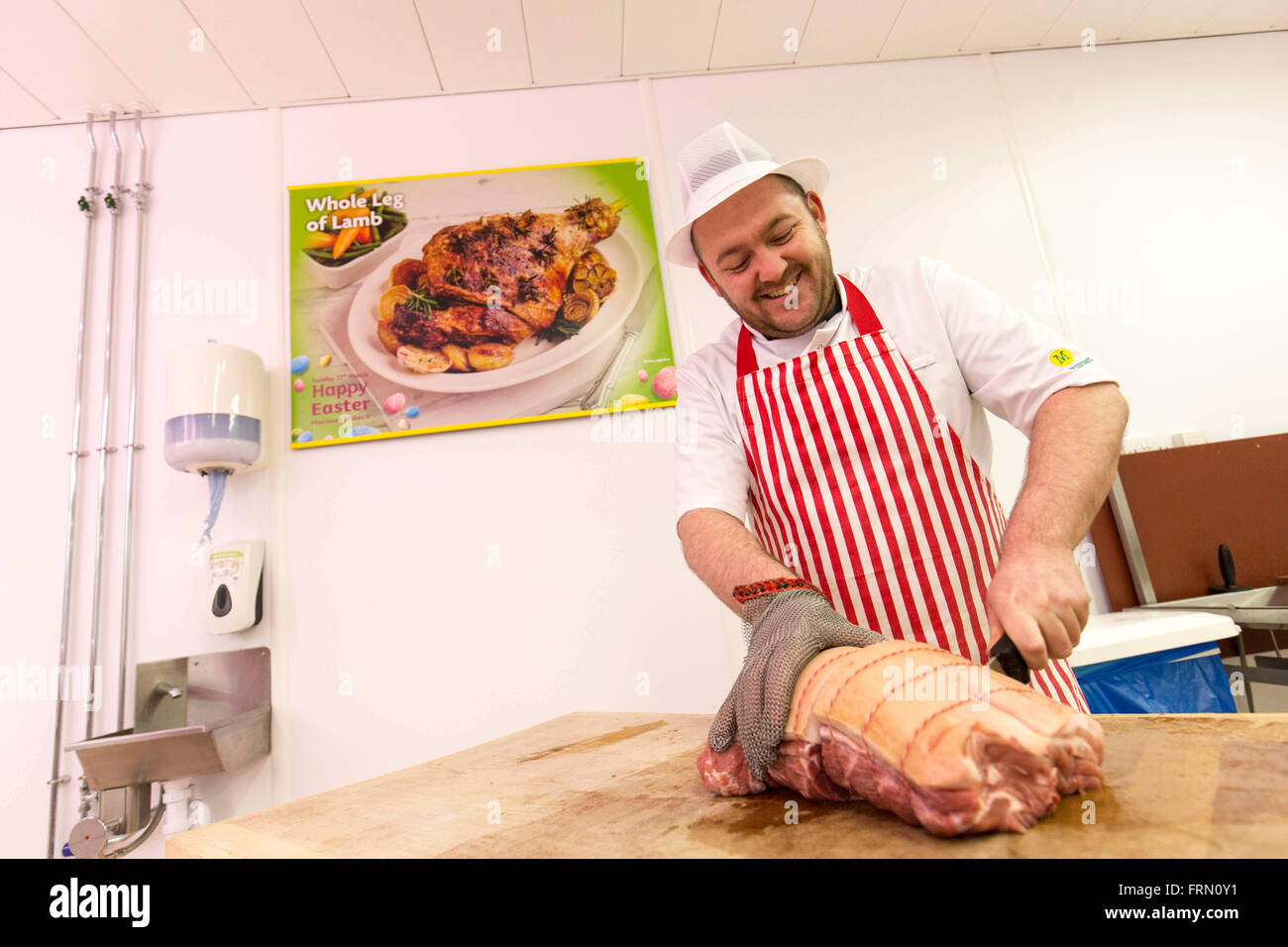 A butcher at a Morrisons fresh look store Stock Photo - Alamy