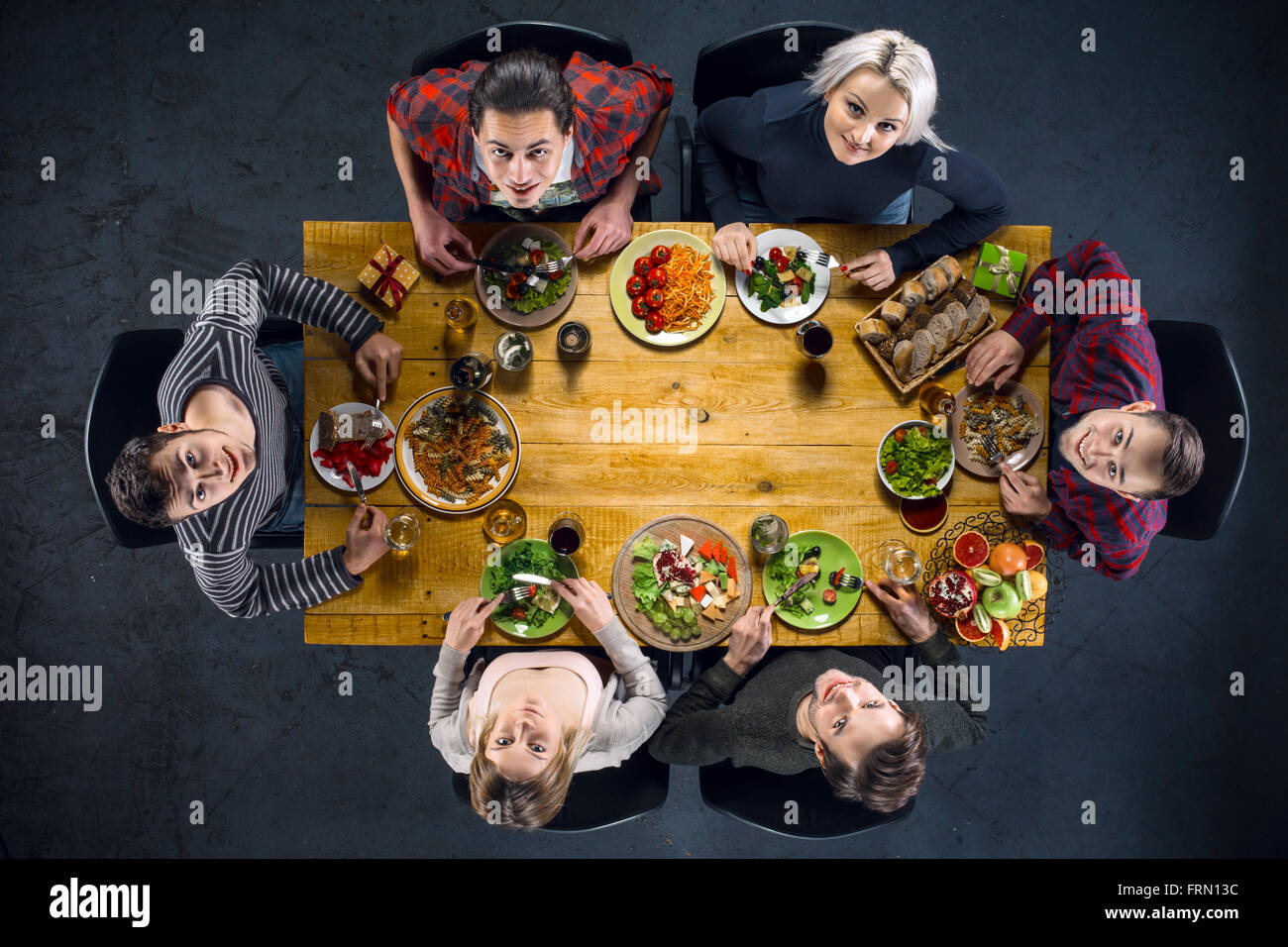 Top view of friends at table with food Stock Photo - Alamy