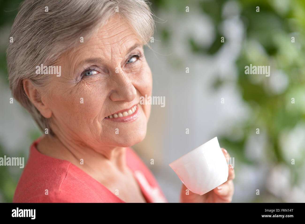 happy retired woman Stock Photo - Alamy