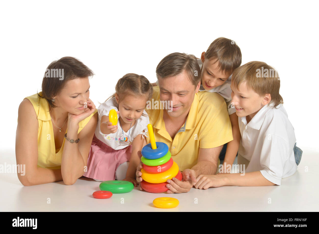 Happy family playing Stock Photo - Alamy