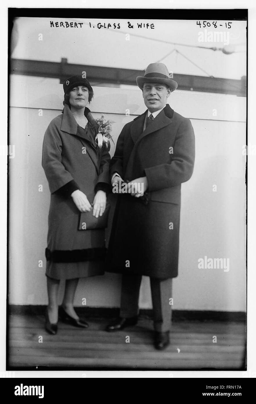 This photograph features Herb I Glass and his wife, capturing a personal moment of the couple ...