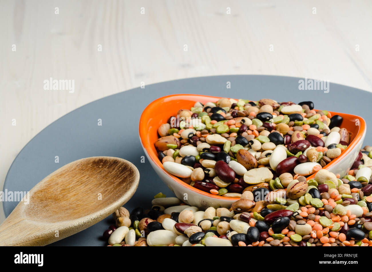 legumes in a dish, close up, background Stock Photo - Alamy