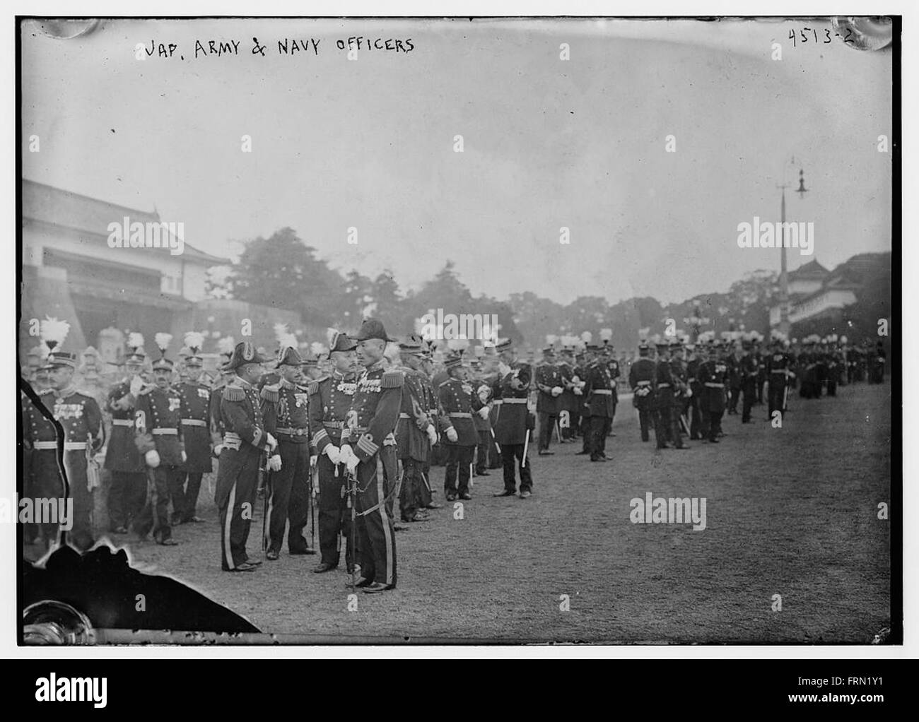 This photograph captures Japanese army and navy officers, providing ...