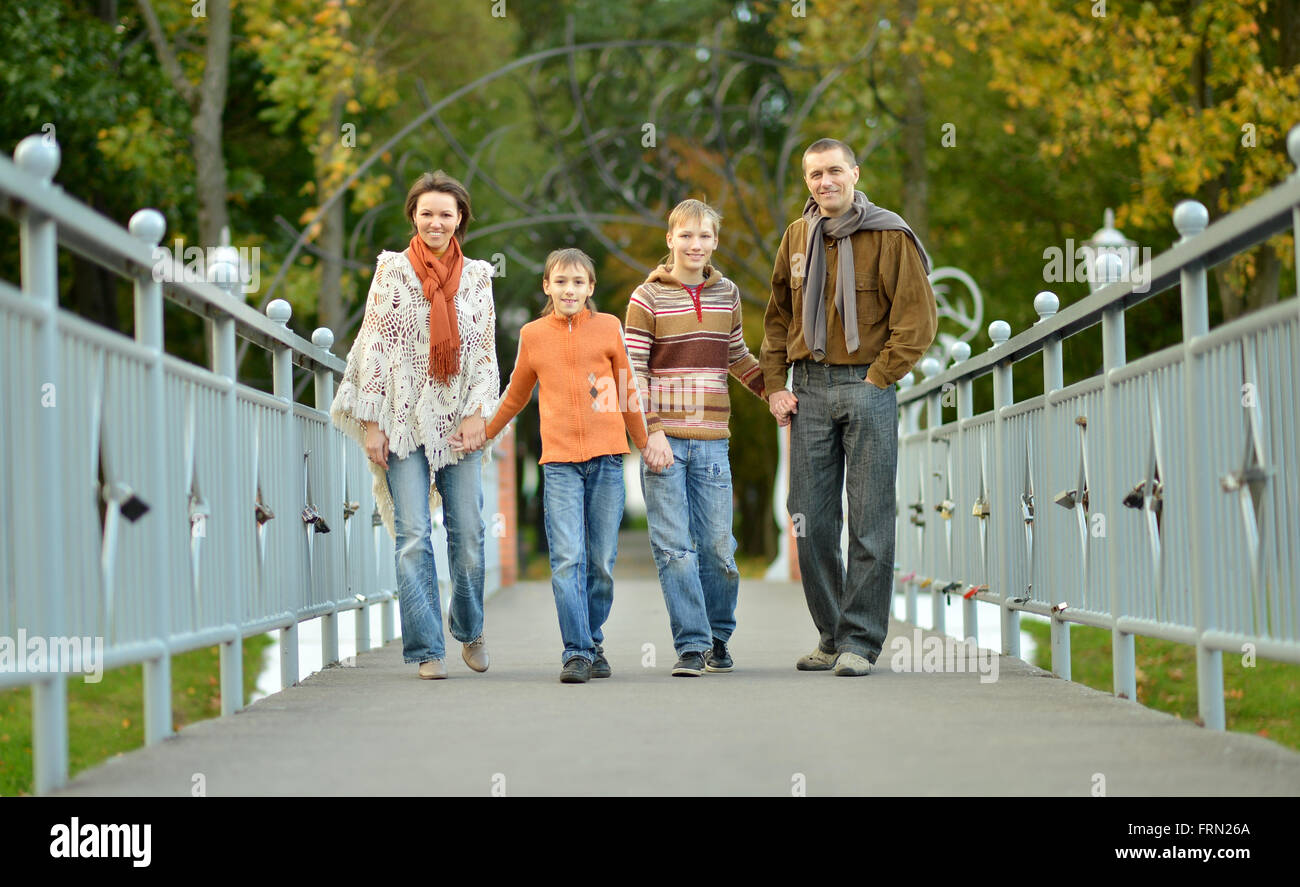 Happy family of four Stock Photo - Alamy