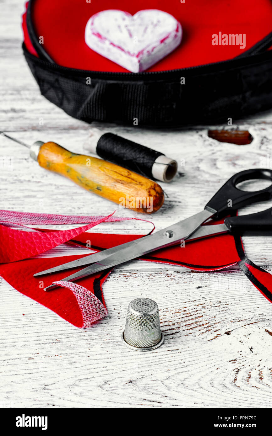 Sewing tool for needlework and leather scraps Stock Photo - Alamy