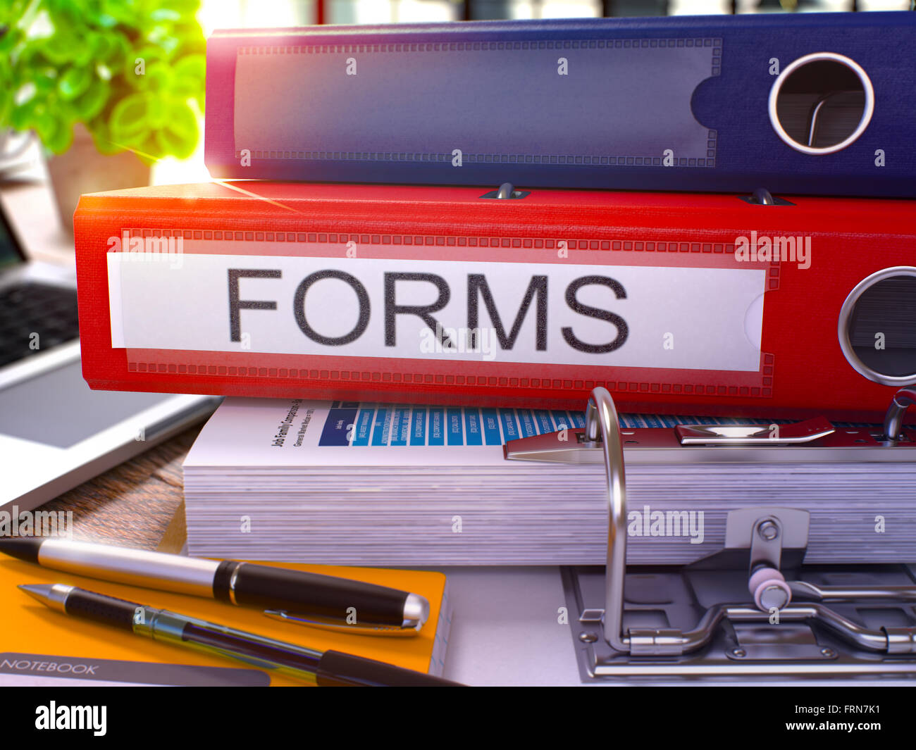 Forms on Red Ring Binder. Blurred, Toned Image Stock Photo - Alamy