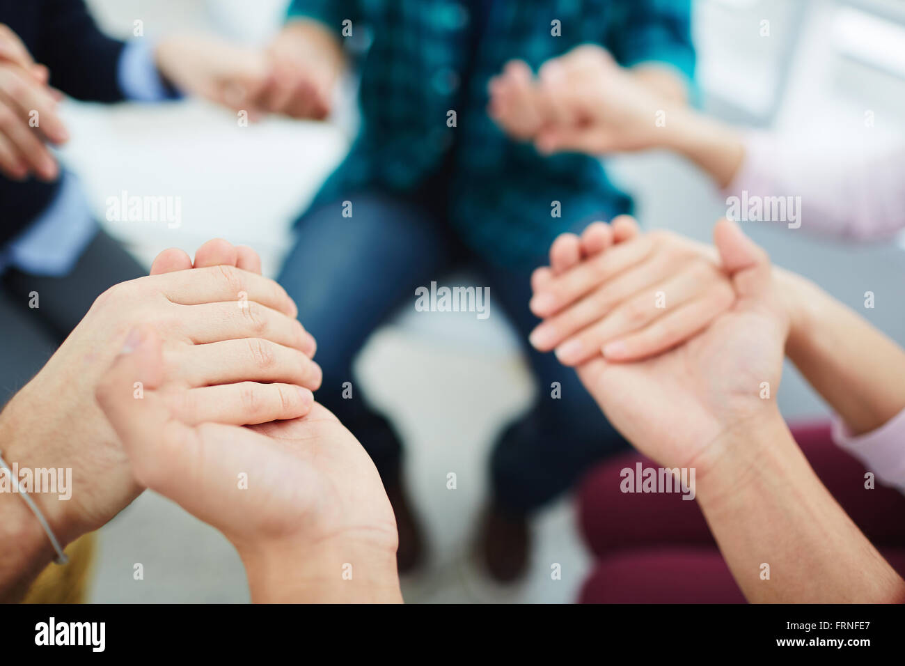 Hand in hand Stock Photo - Alamy